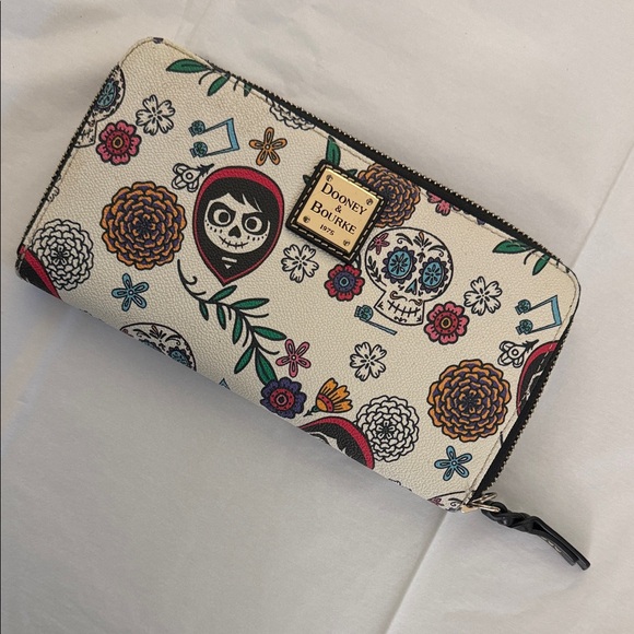 Dooney & Bourke | Bags | Dooney Bourke Disneys Coco Cream Wallet | Poshmark